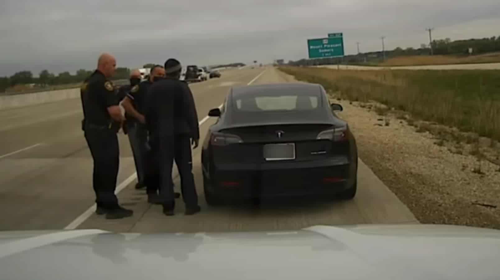 Video shows a Tesla driver being pulled over for driving while asleep